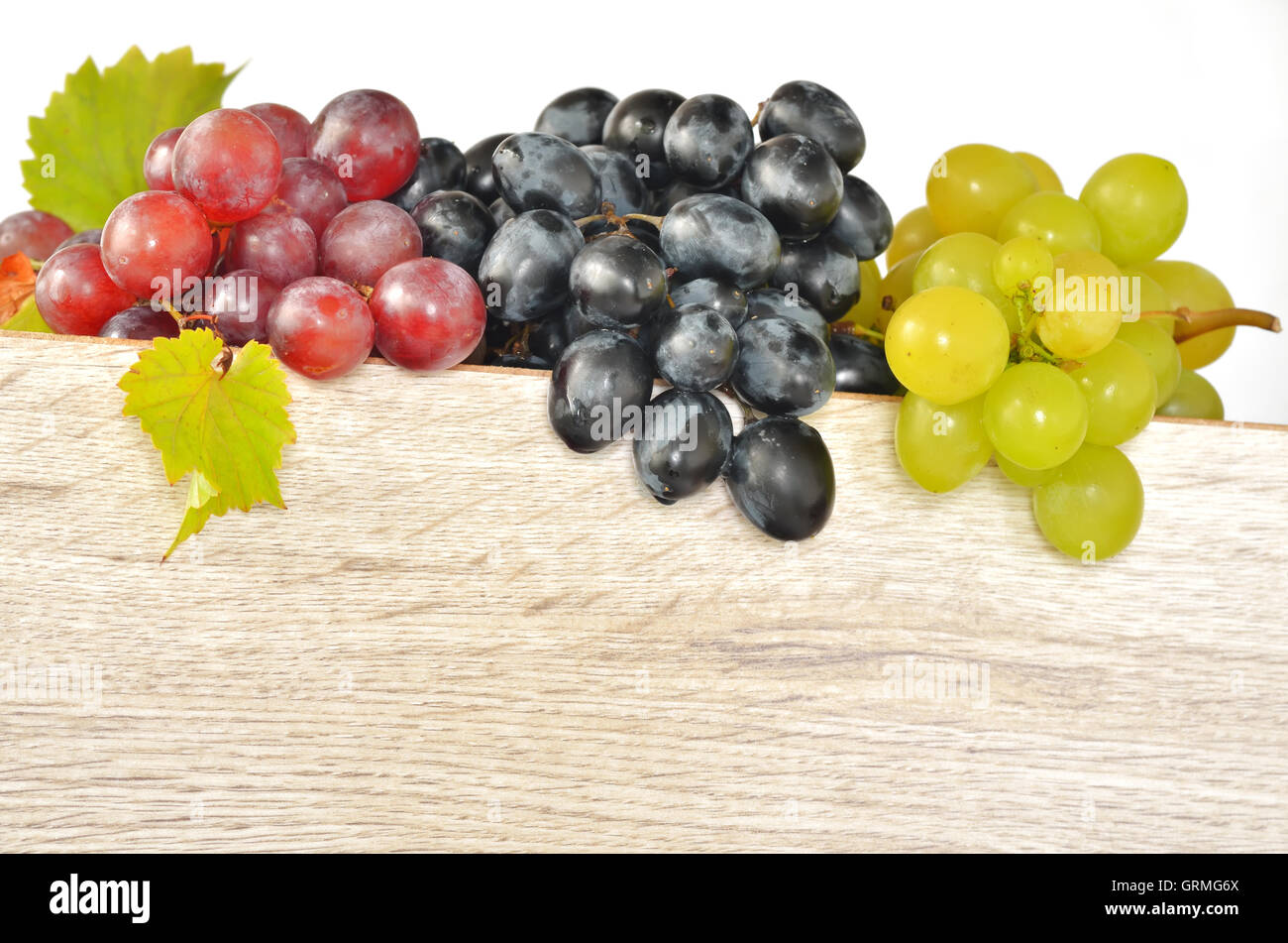 types of grapes on wood Stock Photo - Alamy