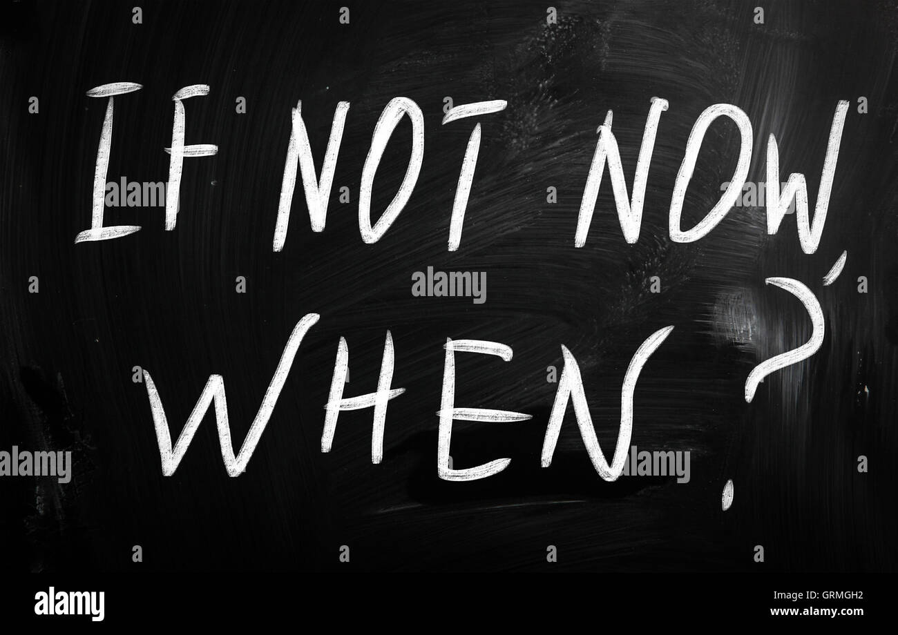 If not now, when? handwritten with white chalk on a blackboard Stock ...