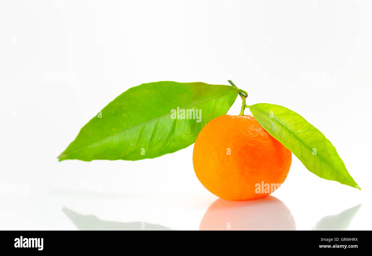 mandarin with leaf Stock Photo - Alamy