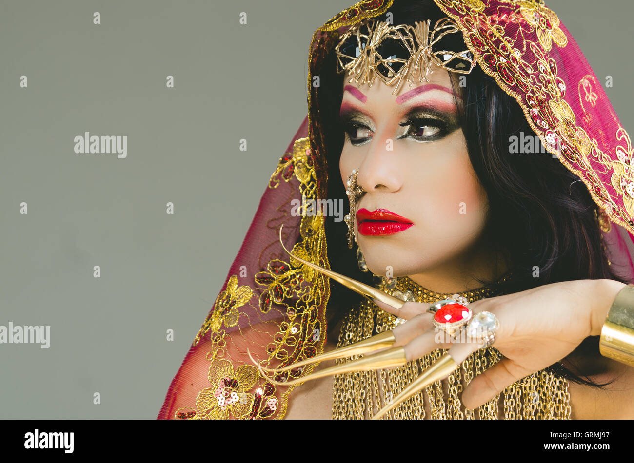 Headshot woman dressed in traditional hindu clothing, heavily decorated ...