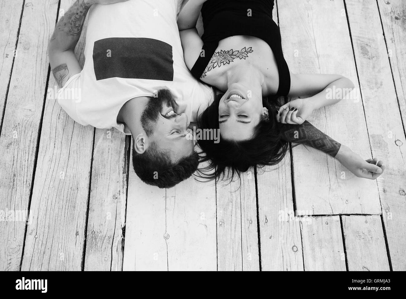 Smiling woman hugging white Black and White Stock Photos & Images - Alamy