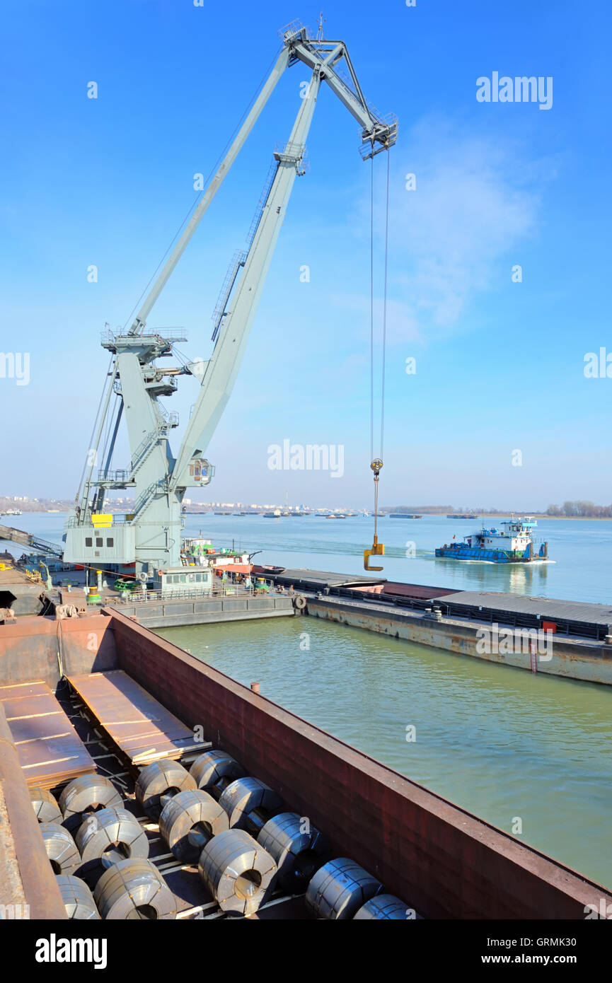 Crane and steel plates hi-res stock photography and images - Alamy