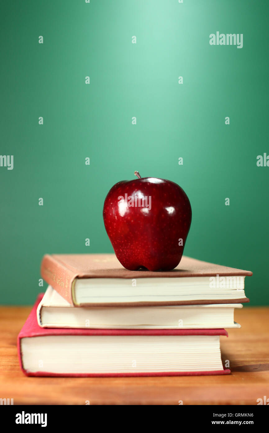 Back to School Books and Apple With Chalkboard Stock Photo - Alamy