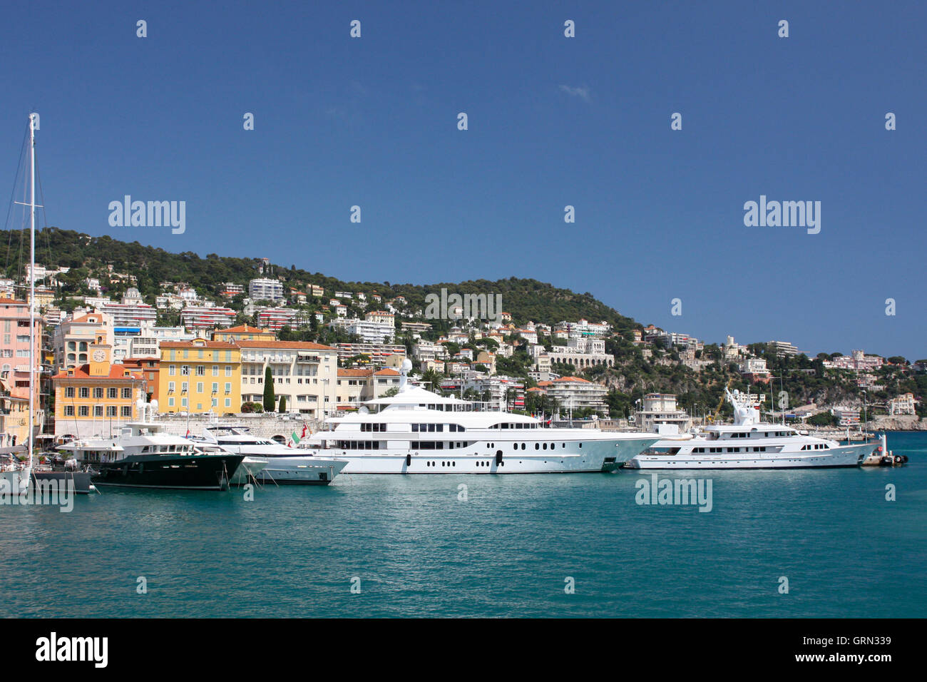Yachts with deflated sails built on the sea surface Stock Photo - Alamy