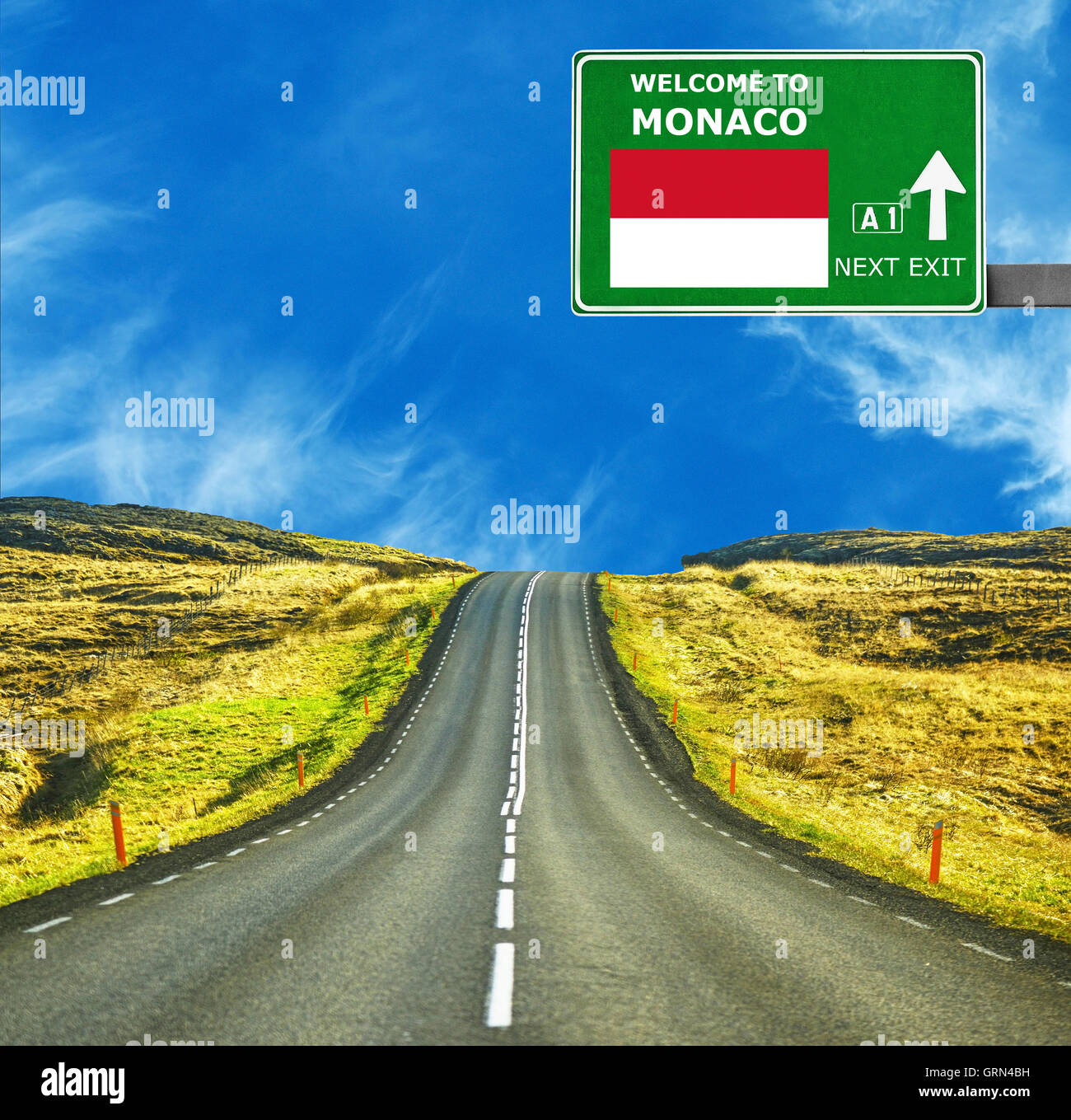 Monaco road sign against clear blue sky Stock Photo - Alamy