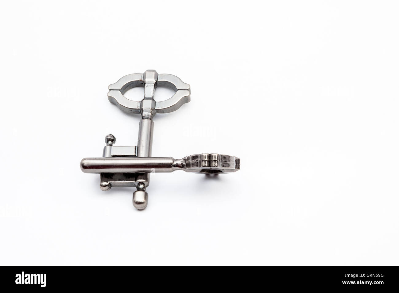 These are metal puzzle keys that can halls together and apart Stock ...