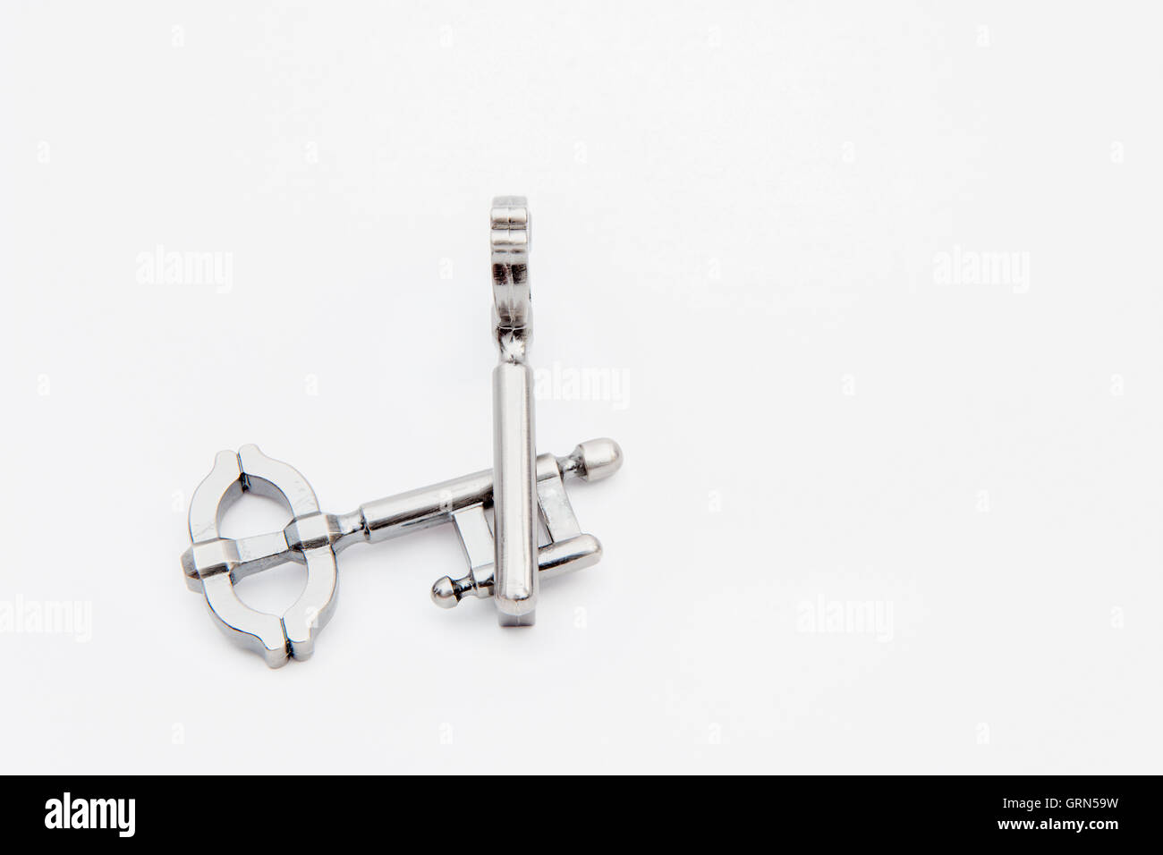 These are metal puzzle keys that can halls together and apart Stock ...