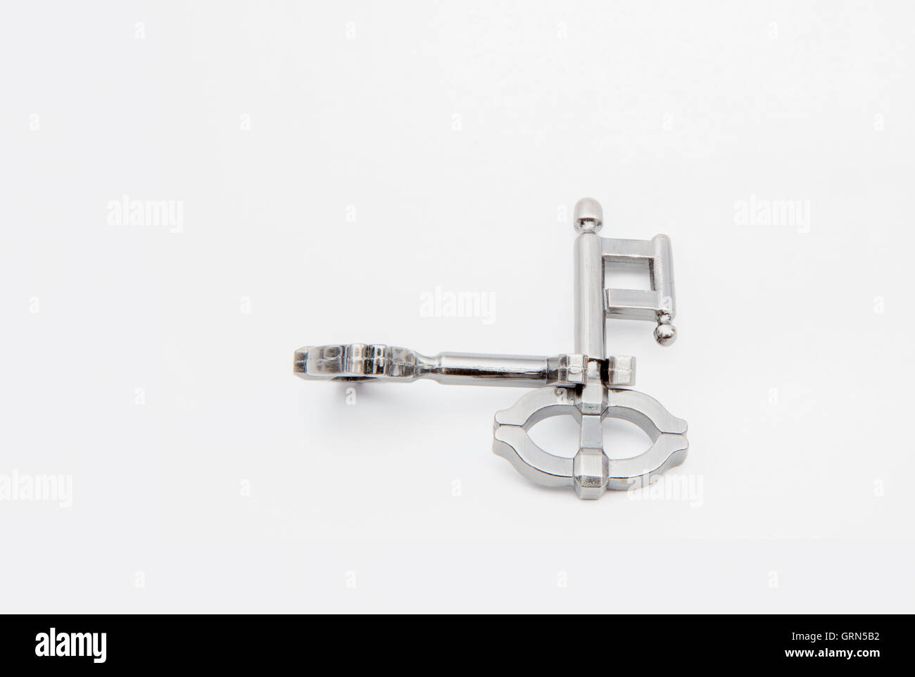 These are metal puzzle keys that can halls together and apart Stock ...