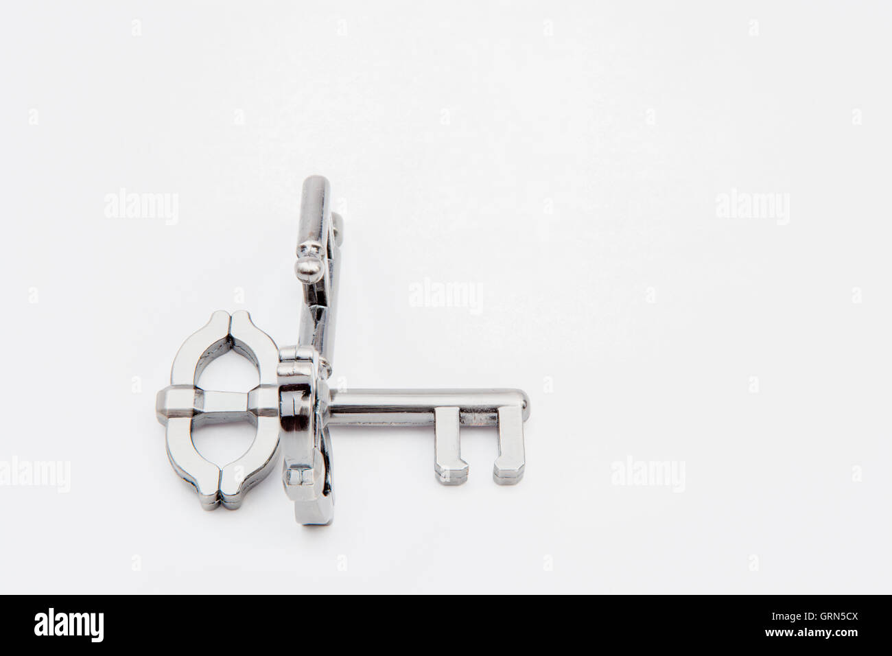 These are metal puzzle keys that can halls together and apart Stock ...