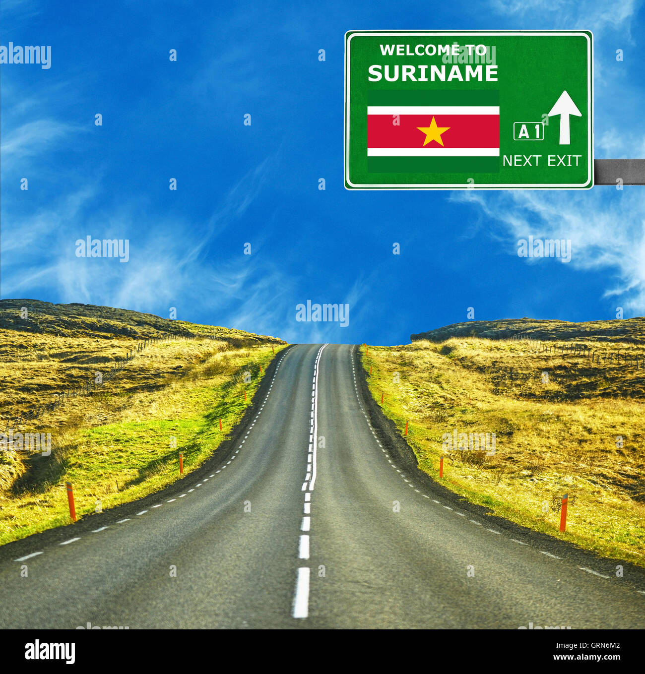 Suriname road sign against clear blue sky Stock Photo - Alamy