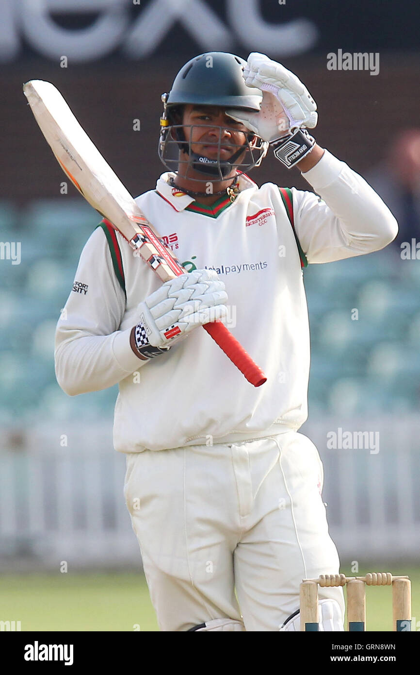 Shiv Thakor of Leicestershire acknowledges scoring 50 runs for his team ...