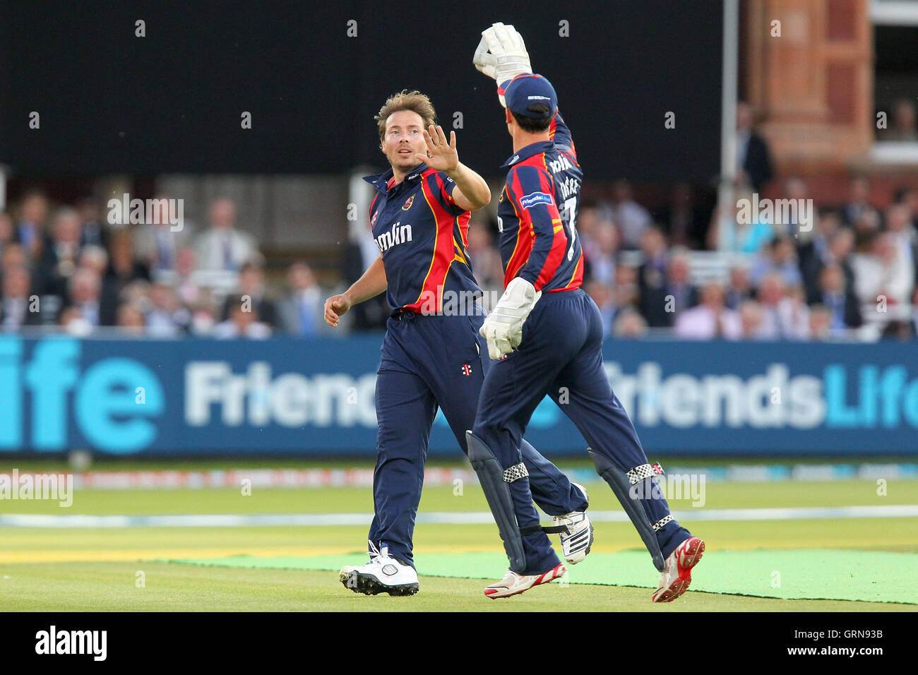 Graham Napier (L) of Essex celebrates the wicket of Paul Stirling with ...