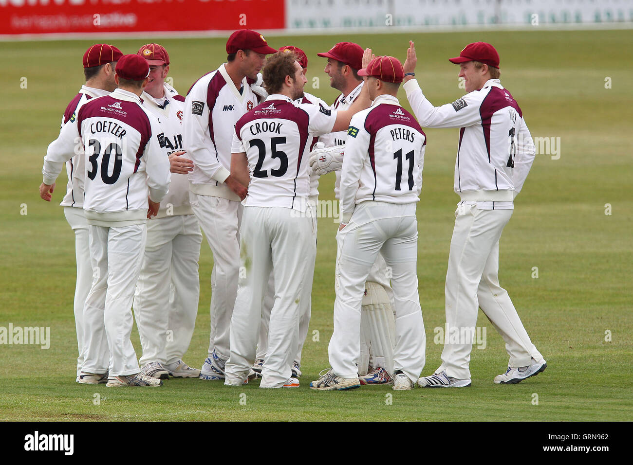 Steven Crook of Northants claims the wicket of Mark Pettini and ...