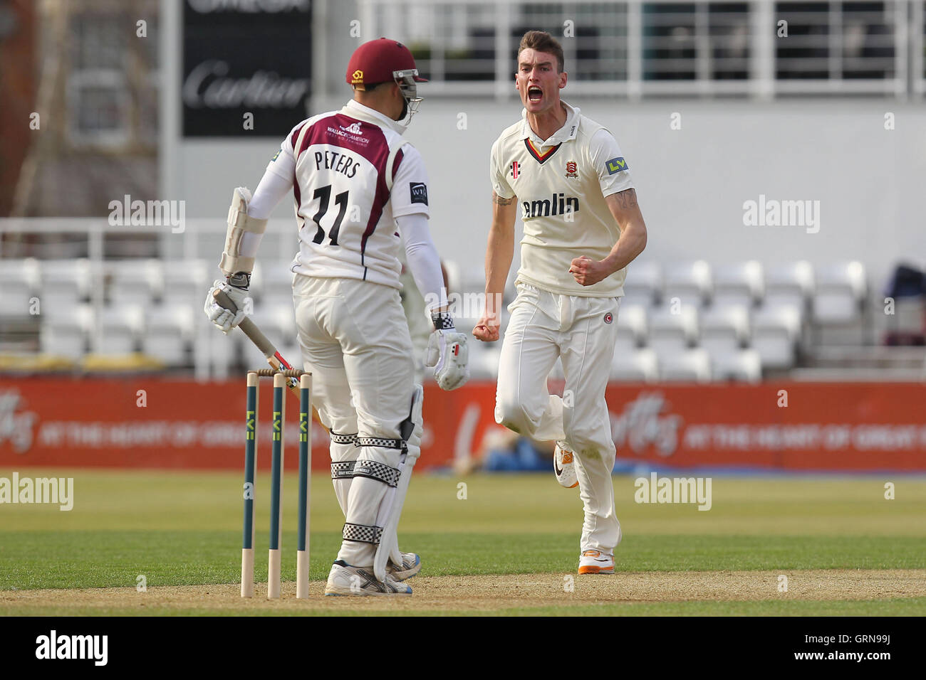 Reece Topley of Essex claims the wicket of Stephen Peters (L ...