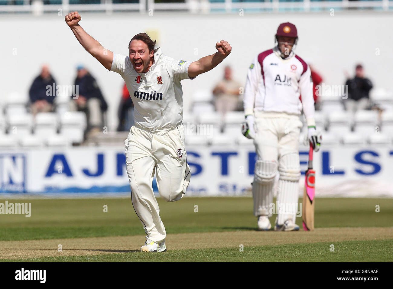 Graham Napier of Essex celebrates the wicket of Northants batsman James ...