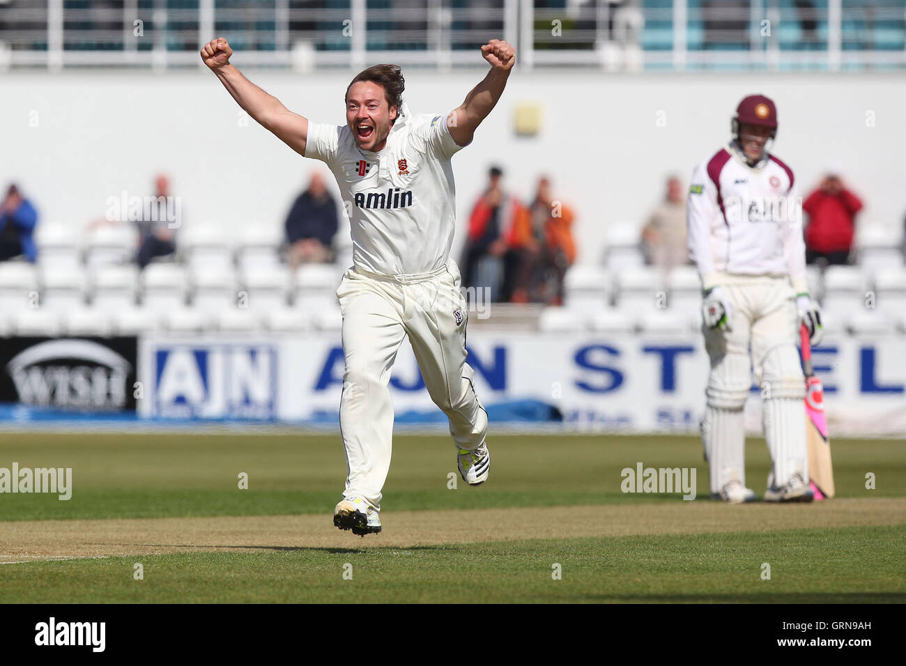 Graham Napier of Essex celebrates the wicket of Northants batsman James ...
