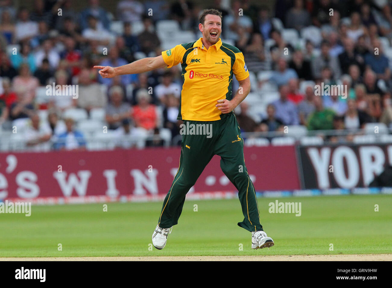 Ian Butler for Nottinghamshire celebrates the wicket of Mark Pettini ...