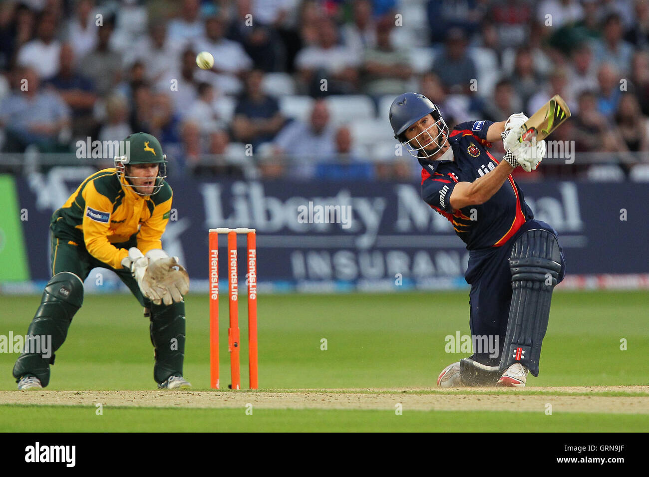 James Foster hits four runs for Essex as Chris Read looks on ...