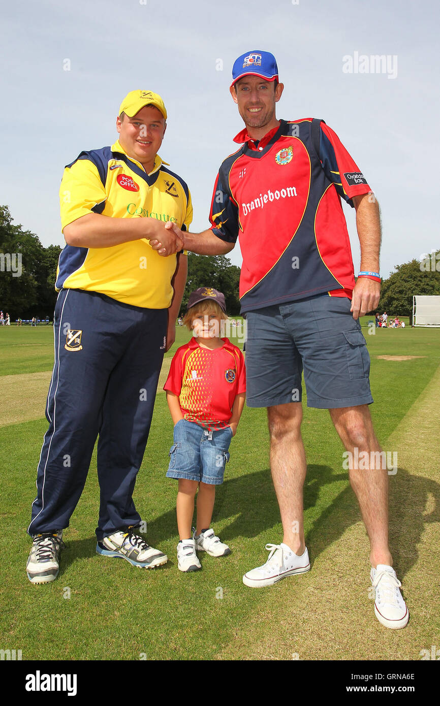 Captains Ollie Peck (L) and David Masters shake hand ahead of the game ...