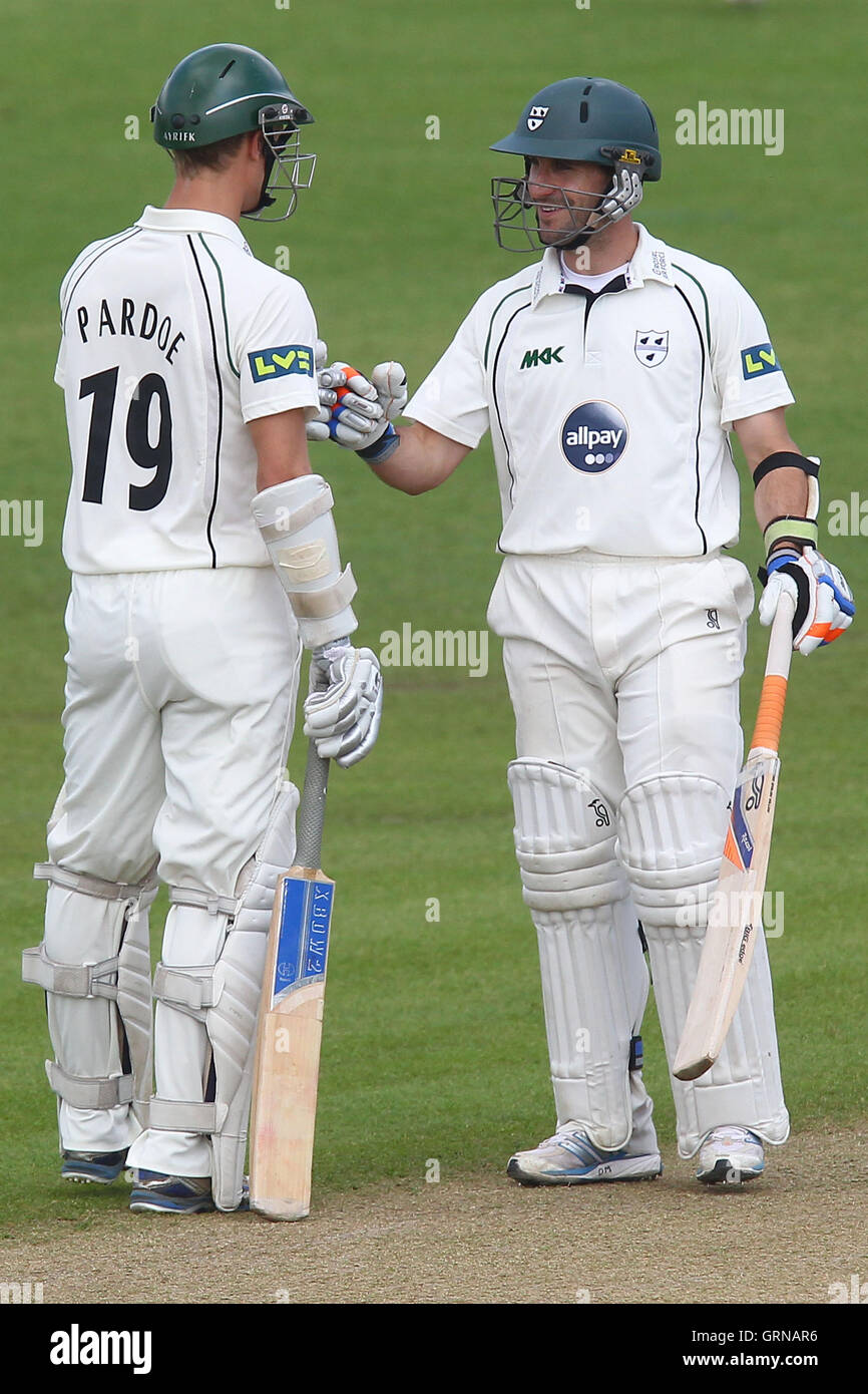 Daryl Mitchell (R) and Matthew Pardoe enjoy a useful opening ...