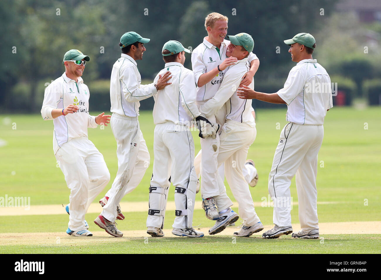 Ben Clifford (C) of Chelmsford celebrates the wicket of Frank Hazel ...