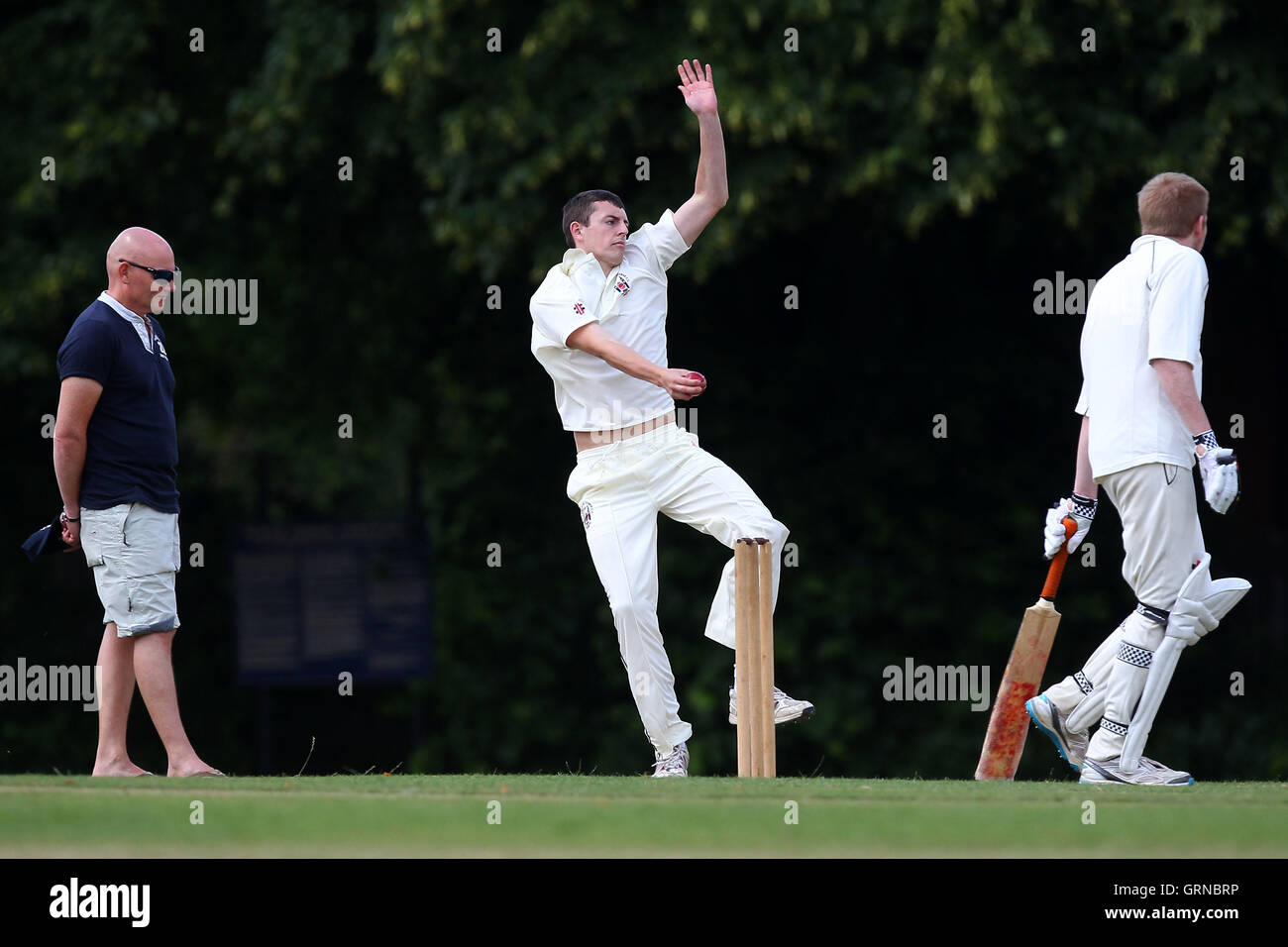 M Roe in bowling action for Havering - Herongate CC vs Havering-atte ...