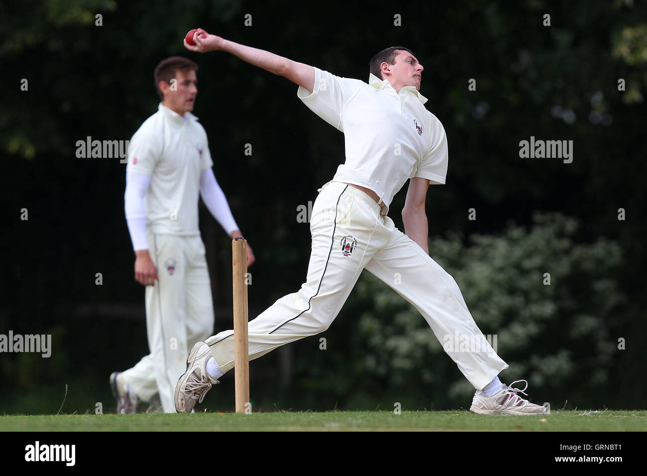 M Roe in bowling action for Havering - Herongate CC vs Havering-atte ...