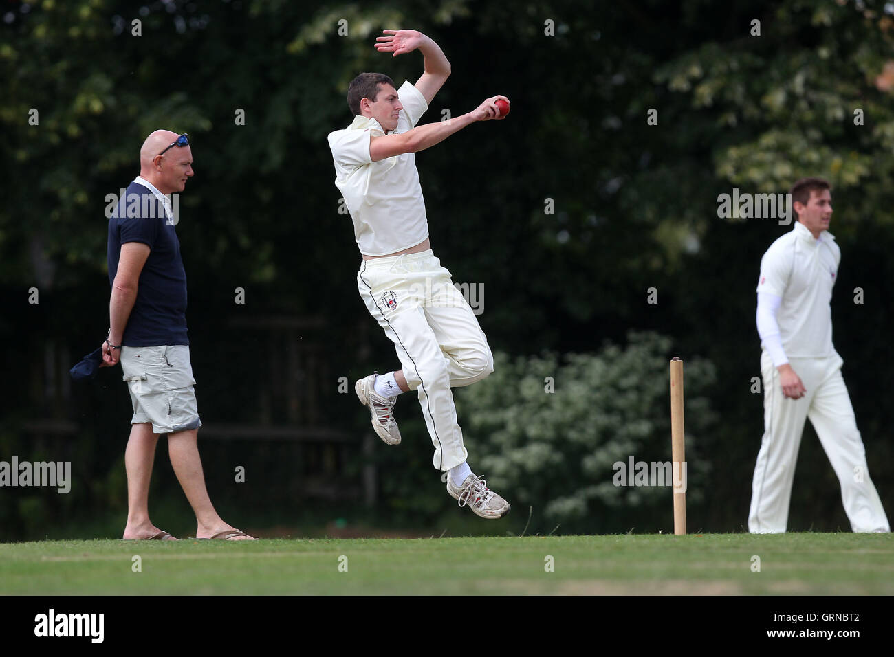 M Roe in bowling action for Havering - Herongate CC vs Havering-atte ...
