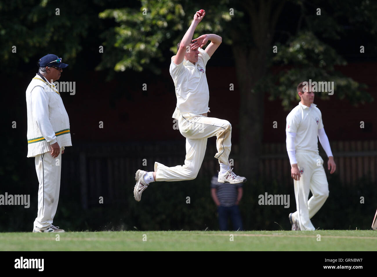 M Roe in bowling action for Havering - Herongate CC vs Havering-atte ...