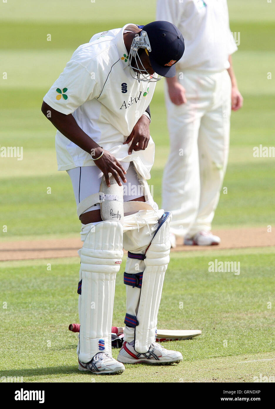 Alex Tudor of Essex rearranges his protective equipment - Essex CCC vs ...