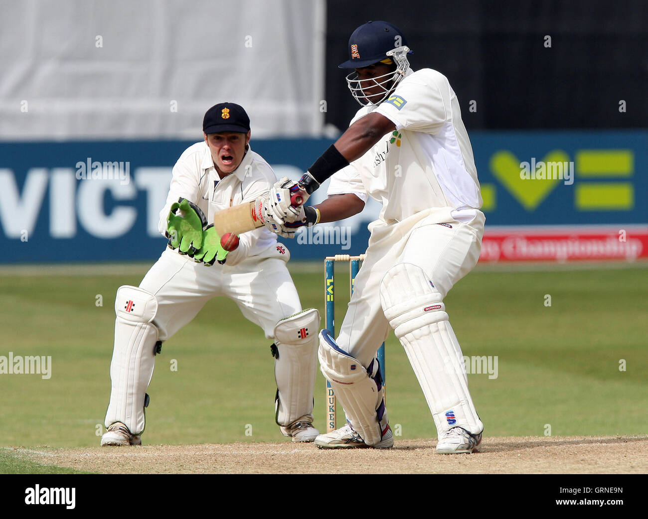 Alex Tudor in batting action for Essex as Jamie Pipe looks on from ...