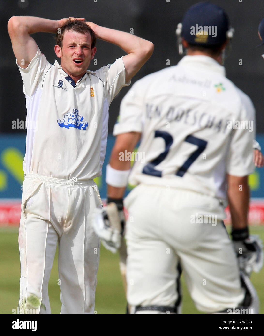 Graham Wagg of Derbyshire (left) shows his frustration after going ...