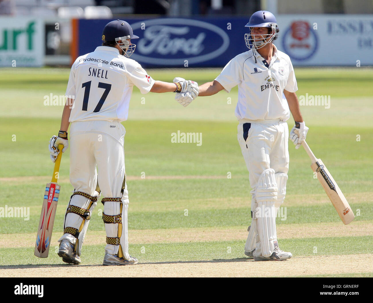Kadeer Ali of Glos (right) congratulates Steve Snell on his half ...