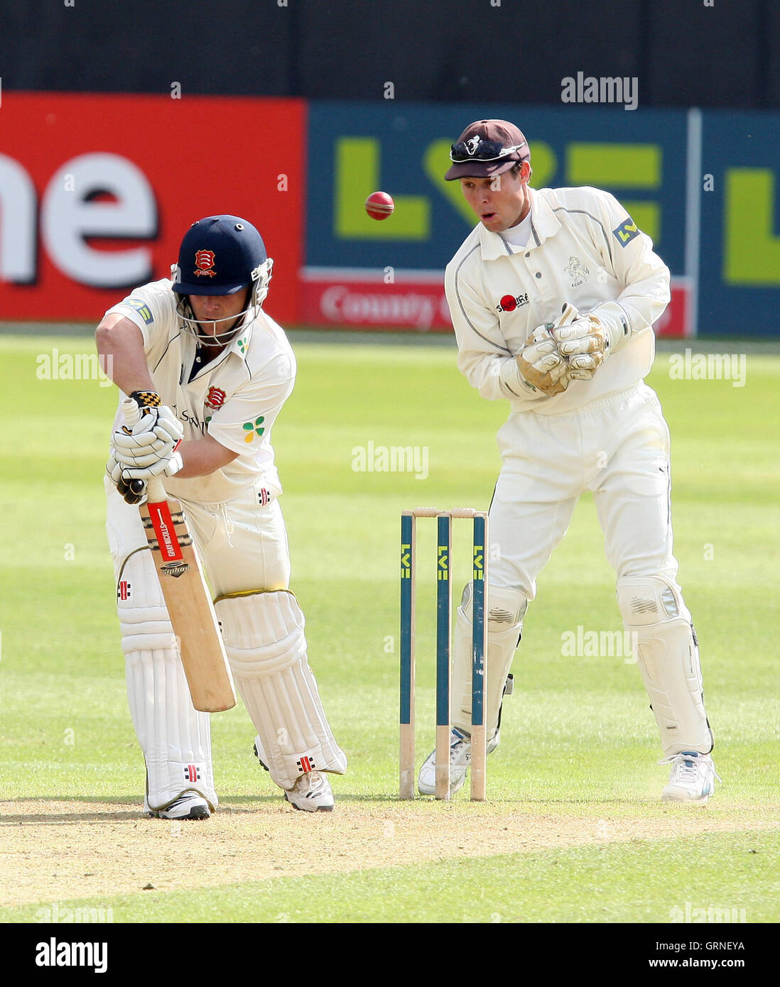 Kent wicket keeper Geraint Jones juggles the ball after a shot by Essex ...