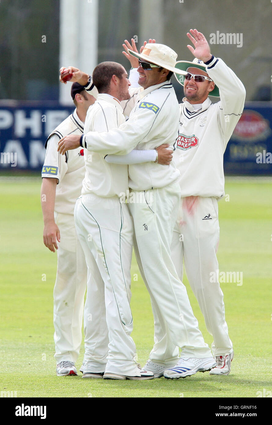 Kent bowler Wayne Parnell (3rd R) celebrates with his team mates after ...