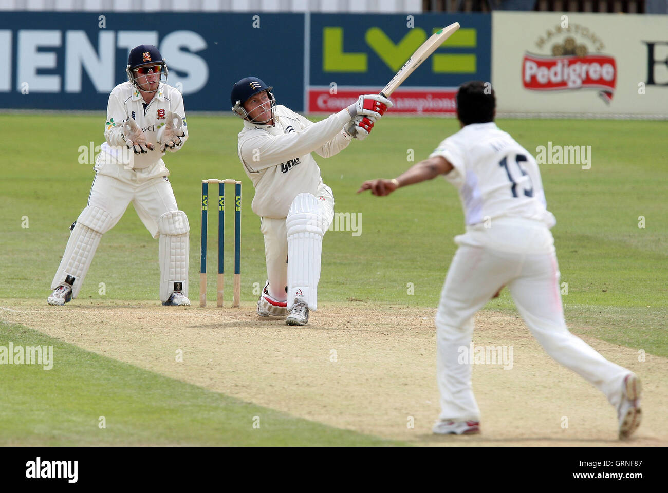 Shaun Udal of Middlesex sends a Danish Kaneria delivery to the boundary ...