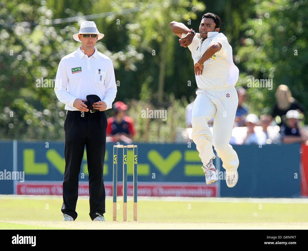 Danish kaneria in bowling action hi-res stock photography and images ...