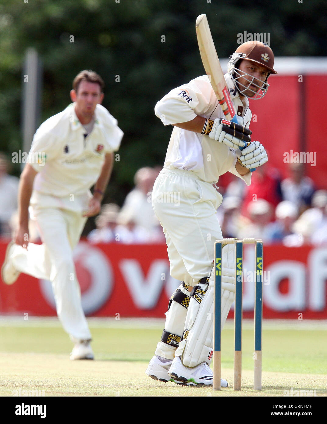 Mark Ramprakash of Surrey looks back as a David Masters delivery passes ...