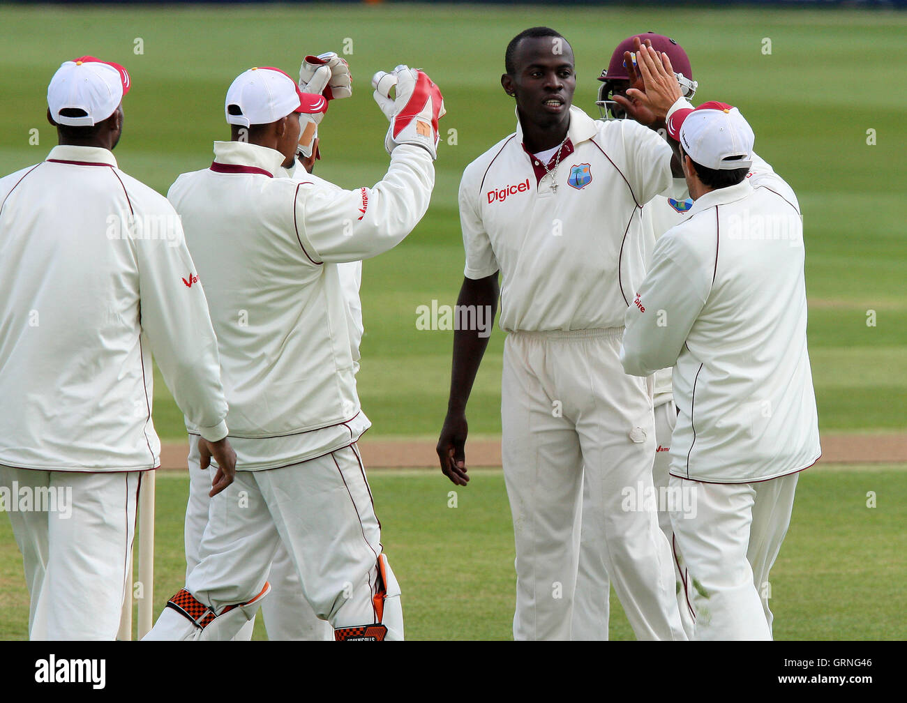Lionel Baker of the West Indies (3rd L) celebrates the wicket of Jason ...