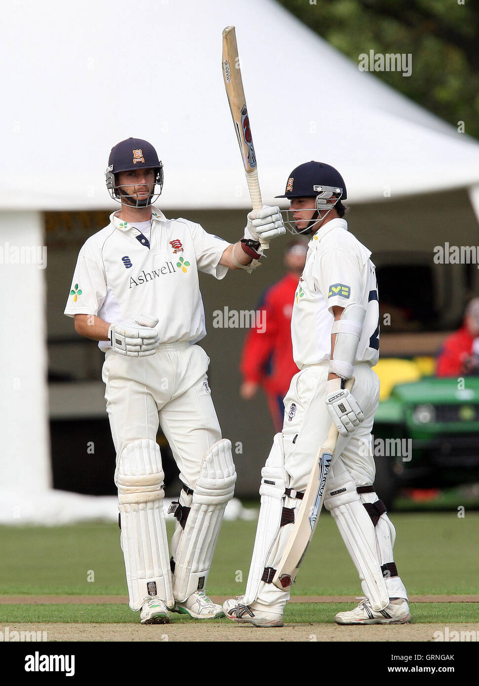 Cricket batsman raising bat hi-res stock photography and images - Alamy
