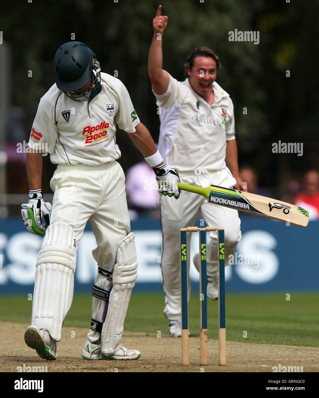 Graham Napier of Essex claims the wicket of Stephen Moore, caught ...
