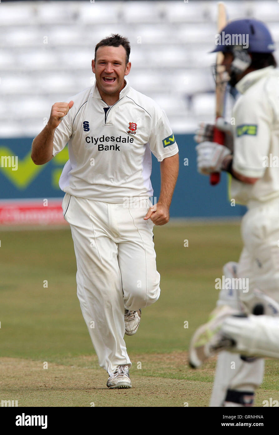 James Middlebrook of Essex celebrates the wicket of Ben Scott (right ...