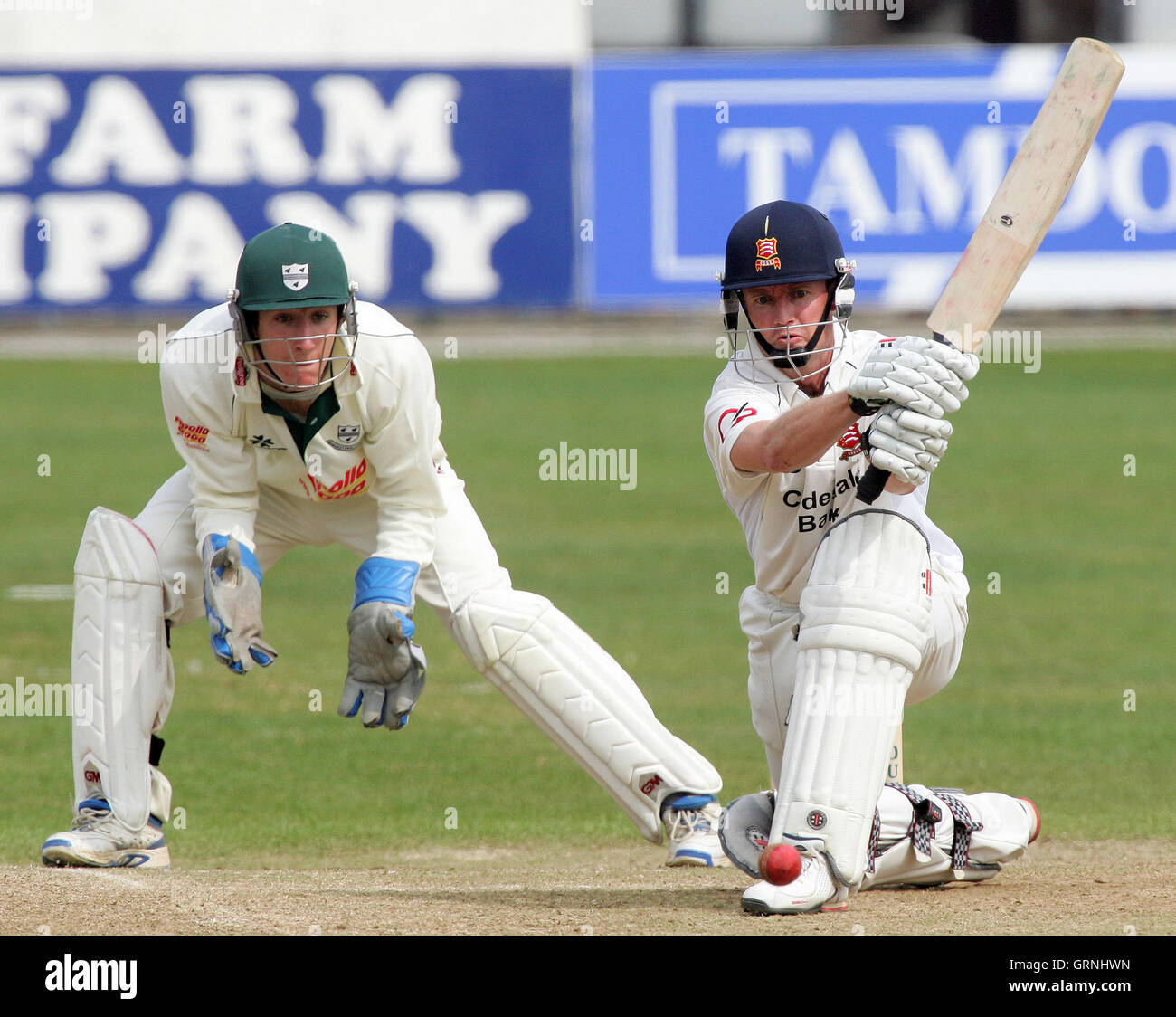 Josh Knappett of Worcs looks on as Grant Flower tries the reverse sweep ...