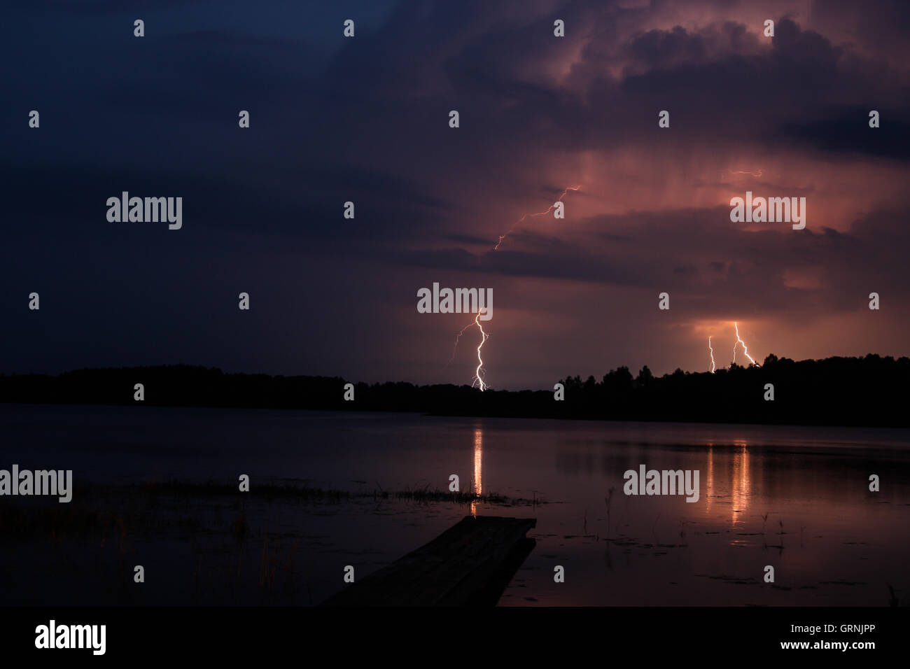 Storm with lightning at night Stock Photo - Alamy