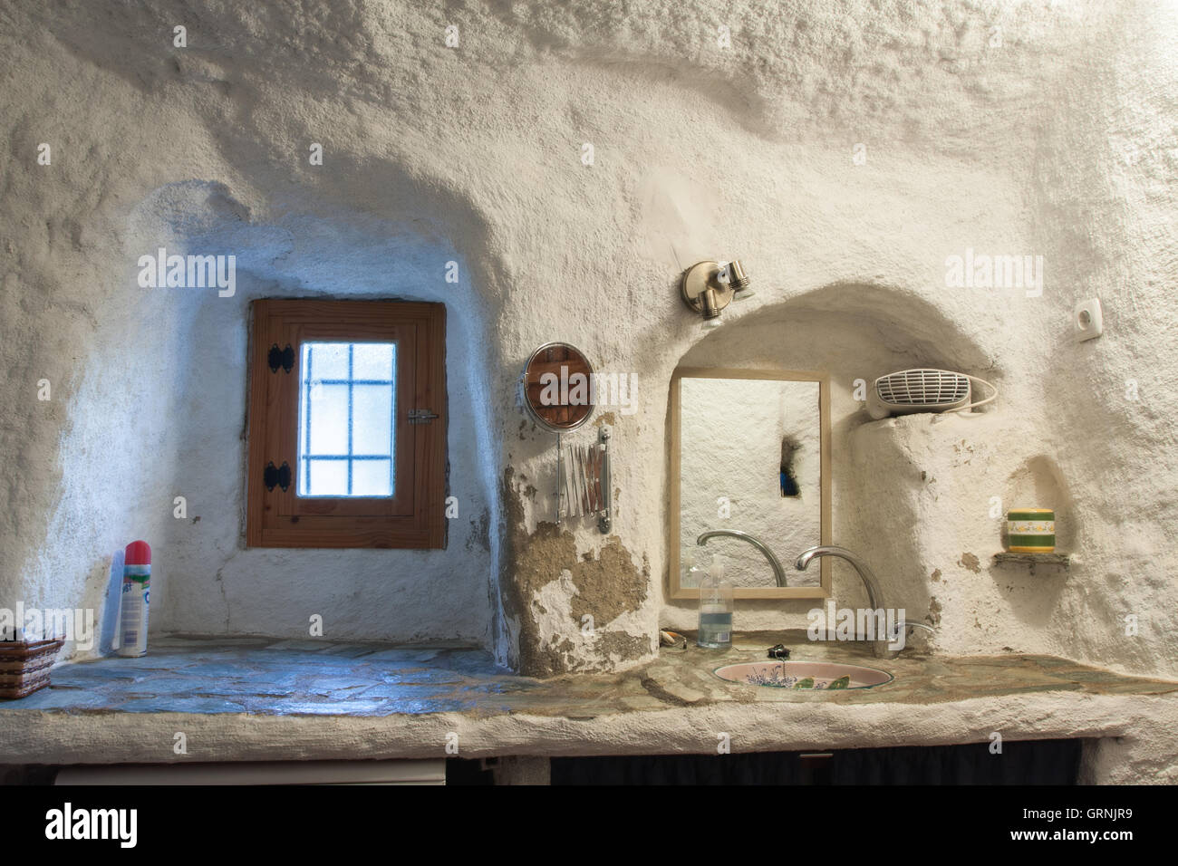 Cave bathroom in Spain Stock Photo - Alamy