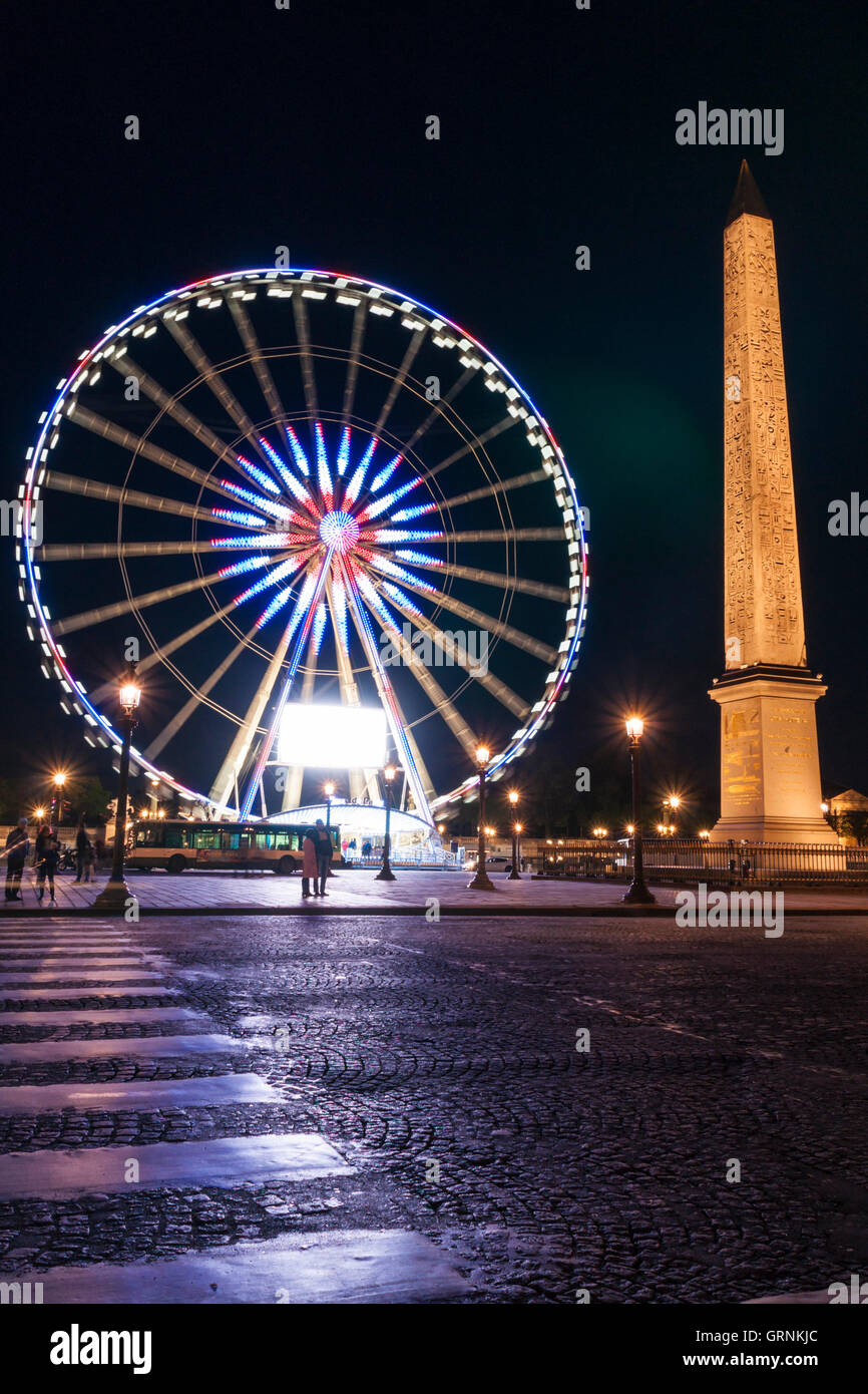 Paris, France. A Ferris Wheel night at the Place de la Concorde, near ...