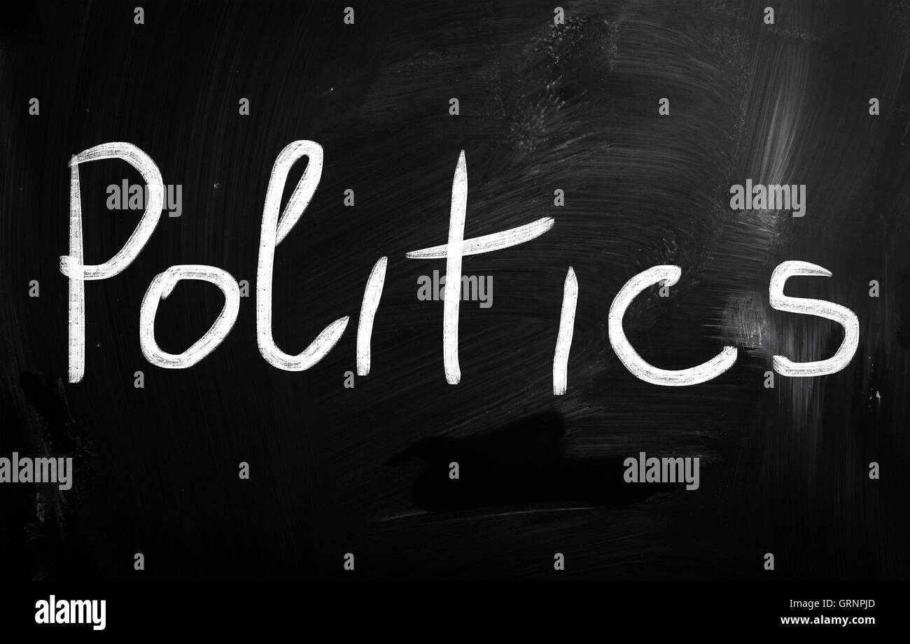 The word "Politics" handwritten with white chalk on a blackboard Stock ...