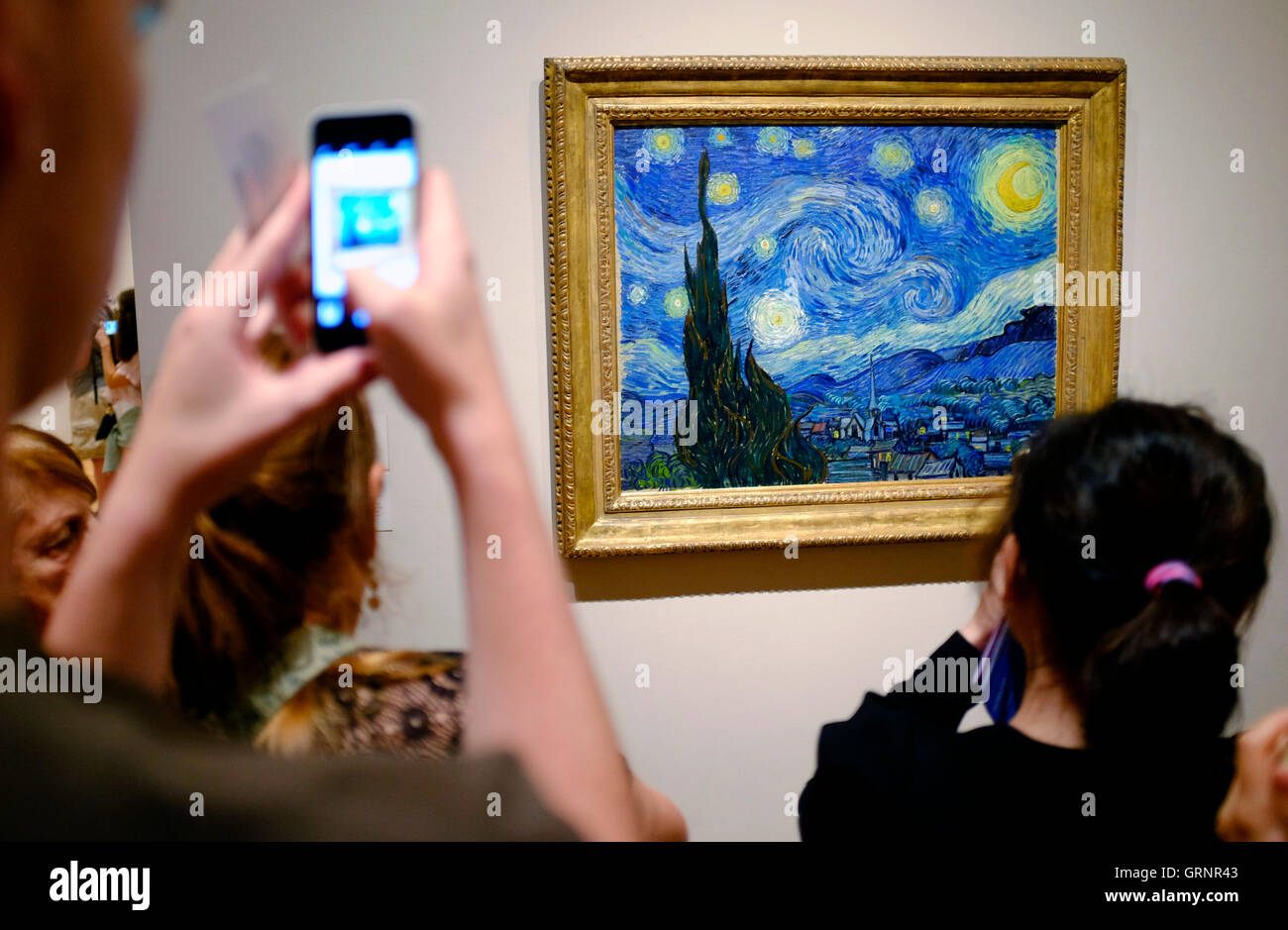 Visitors taking photos of "The Starry Night" by Vincent Van Gogh at ...