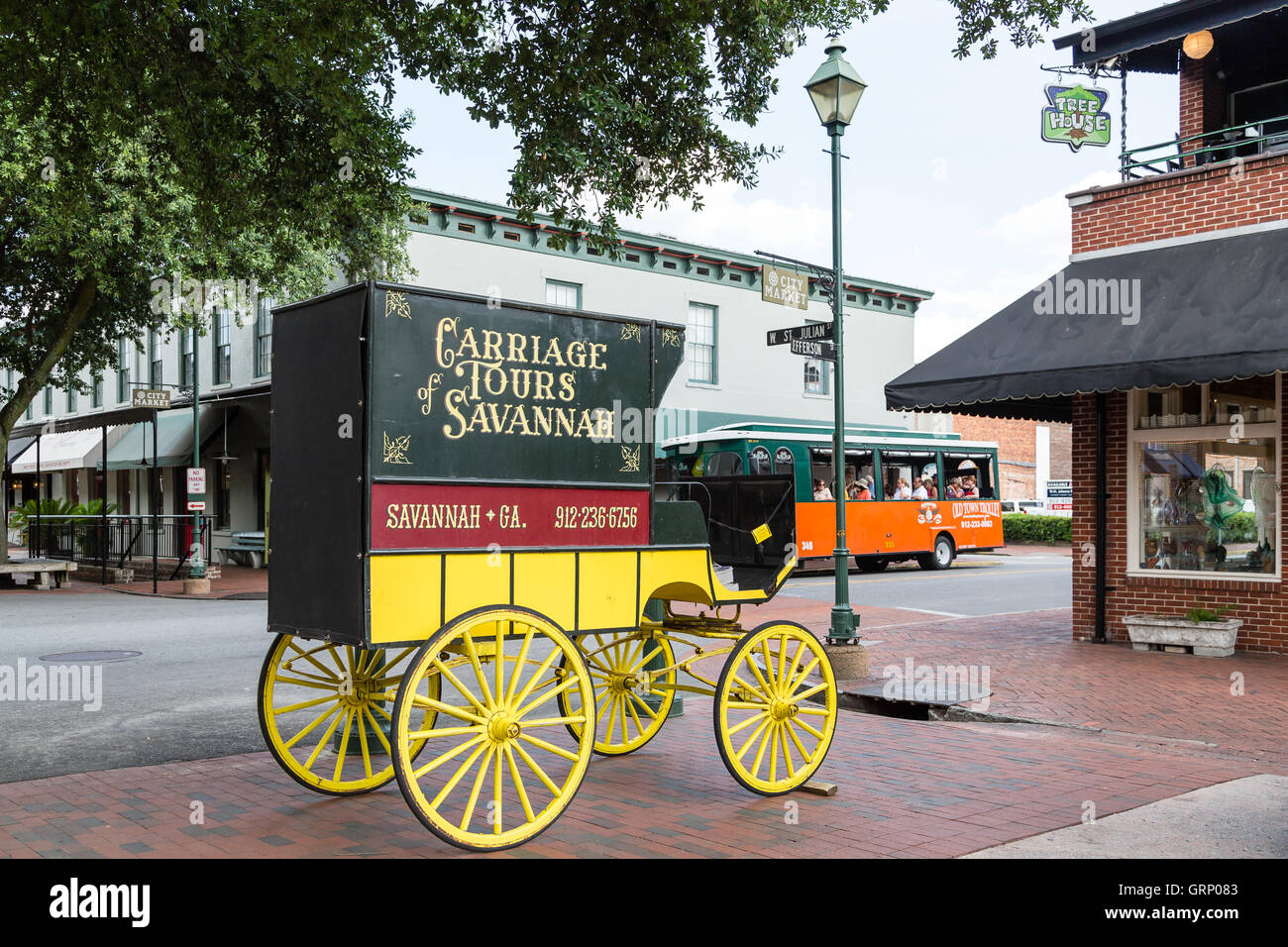 Iconic yellow and green buggy for Carriage Tours of Savannah in Georgia ...
