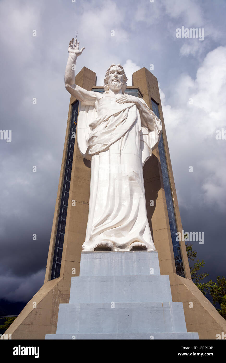Vertical view of El Santisimo statue of Jesus Christ with a dramatic ...